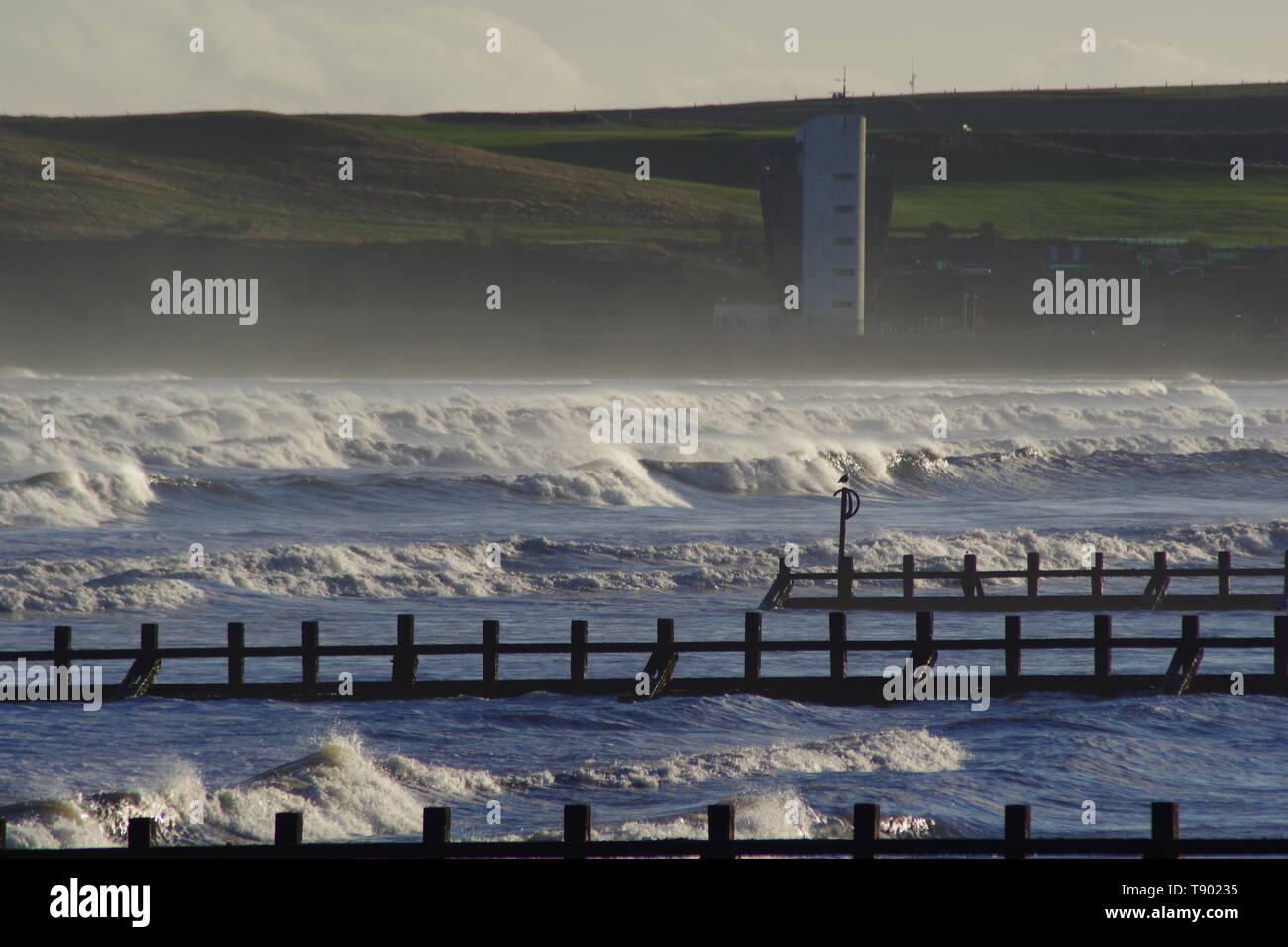 Aberdeen Harbour Control Tower with Rough Waves Breaking onto Aberdeen ...