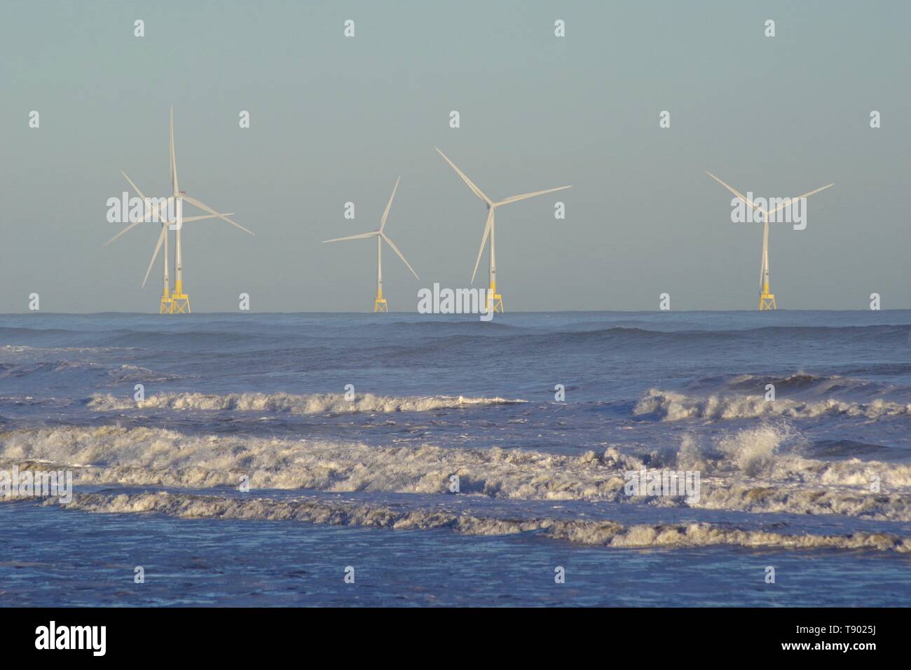 European Offshore Wind Deployment Centre with Rough Waves Breaking onto ...