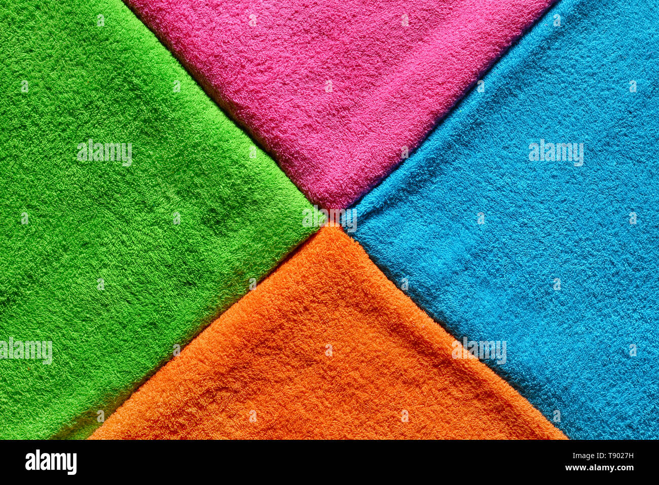 Color terry towels as background, closeup Stock Photo - Alamy