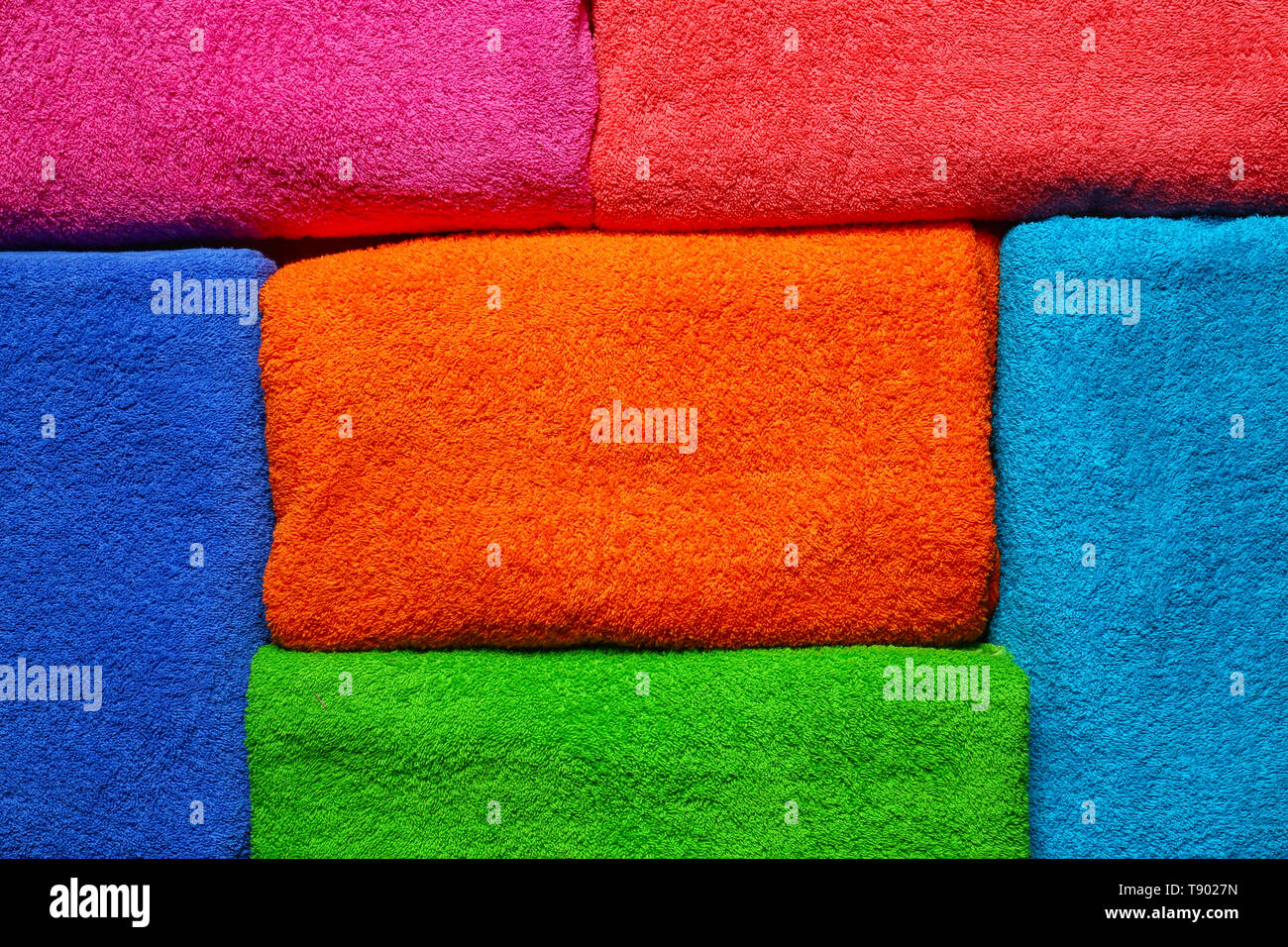 Color terry towels as background Stock Photo - Alamy