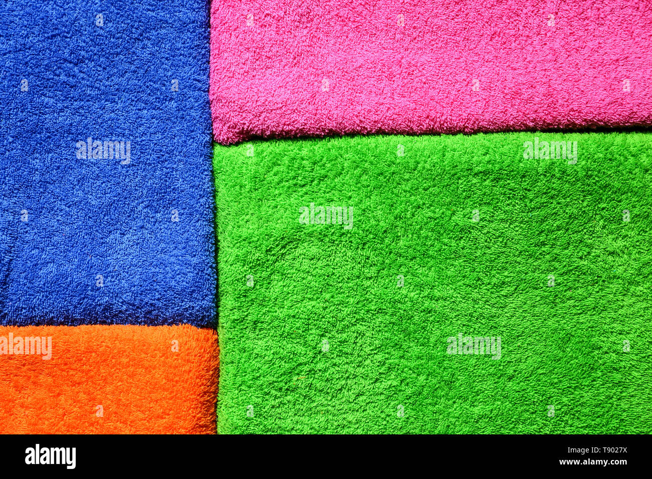 Color terry towels as background, closeup Stock Photo - Alamy