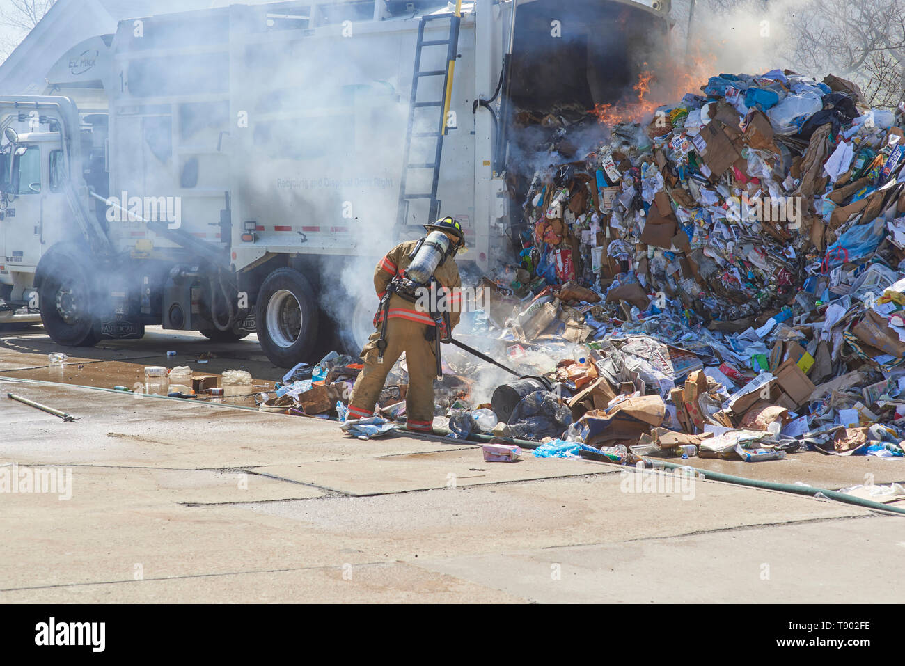 Garbage Truck fire in condominium complex during rubbish pickup Stock ...