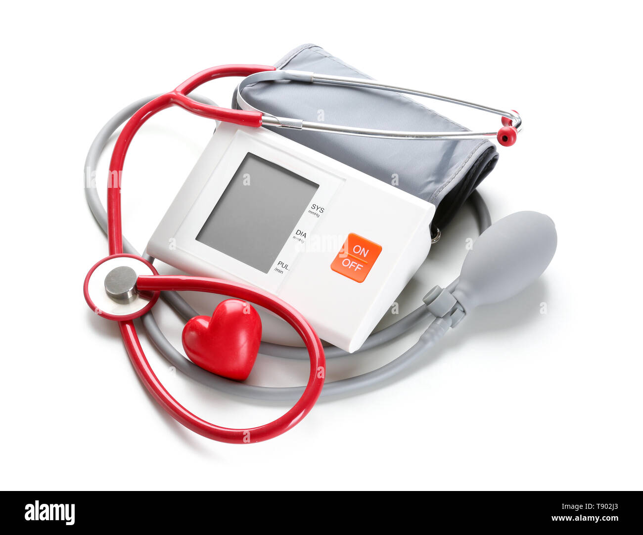 Sphygmomanometer with red heart and stethoscope on white background ...