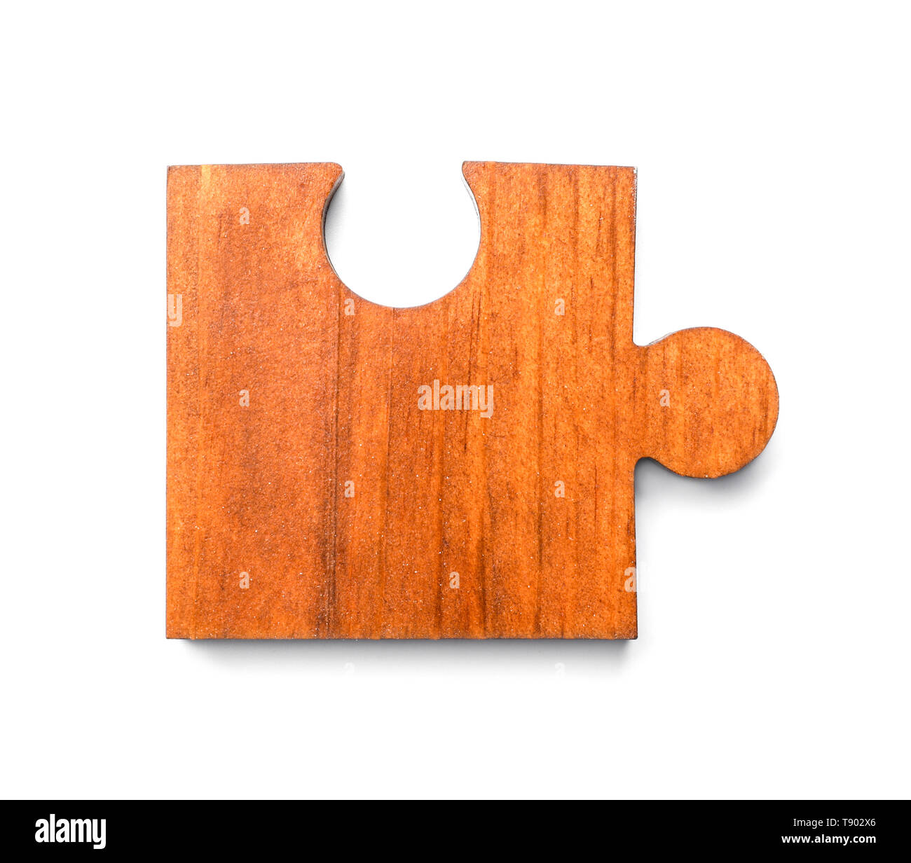 Piece of wooden puzzle on white background Stock Photo - Alamy