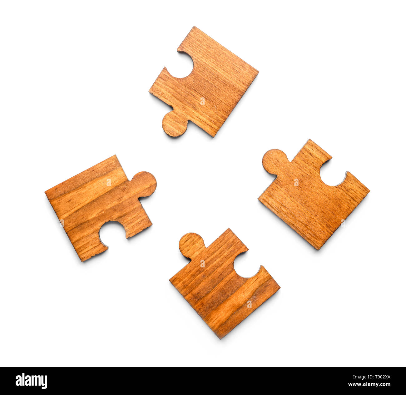 Pieces of wooden puzzle on white background Stock Photo - Alamy
