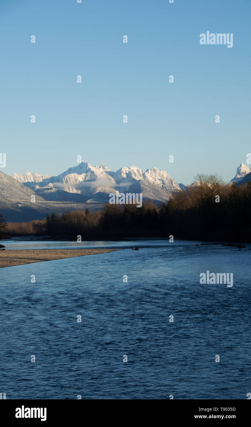 Cascade Mountains and Skykomish River viewed from bridge crossing the ...