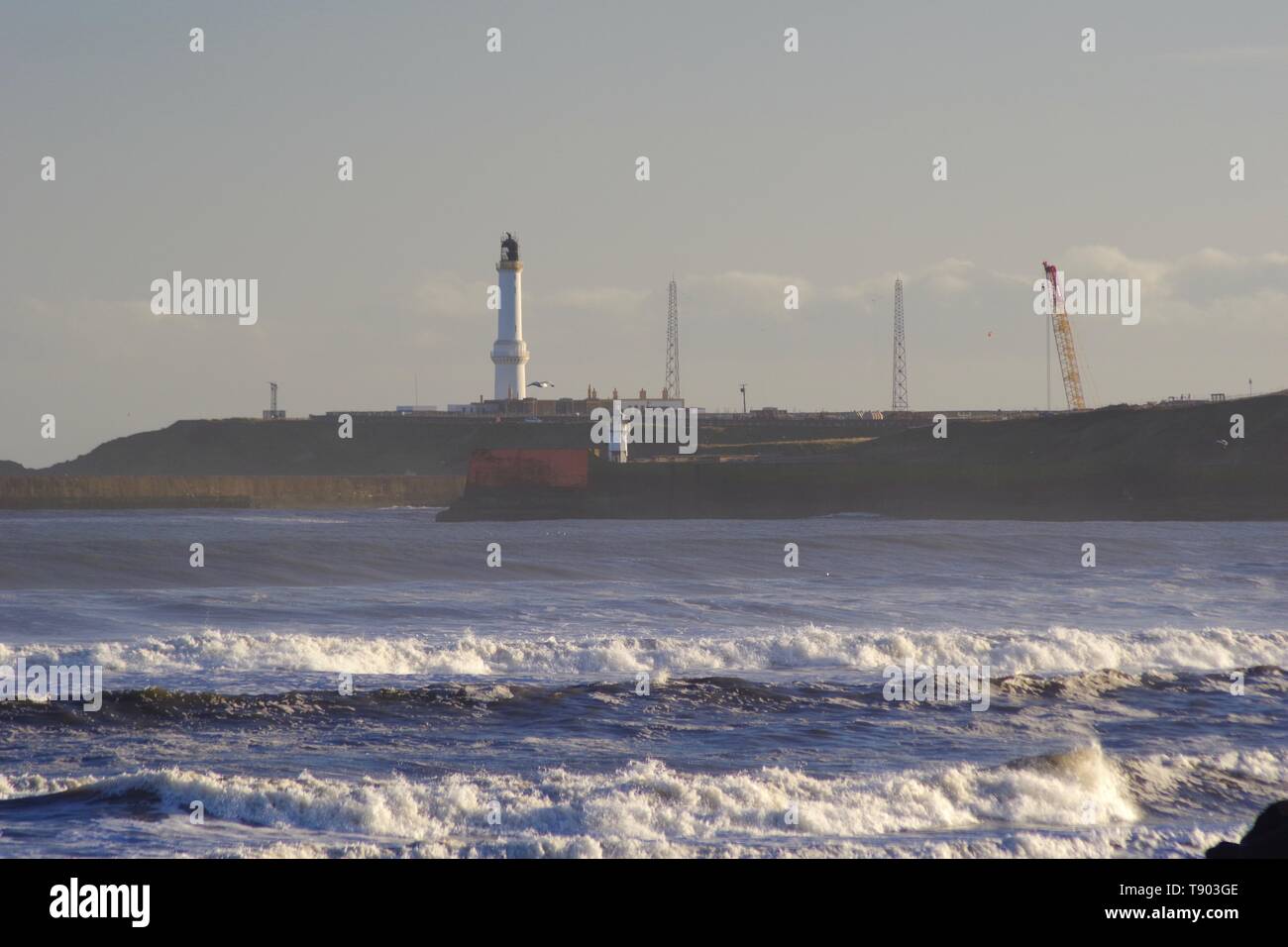 Girdleness Lighthouse and Rough Waves Breaking onto Aberdeen Beach ...
