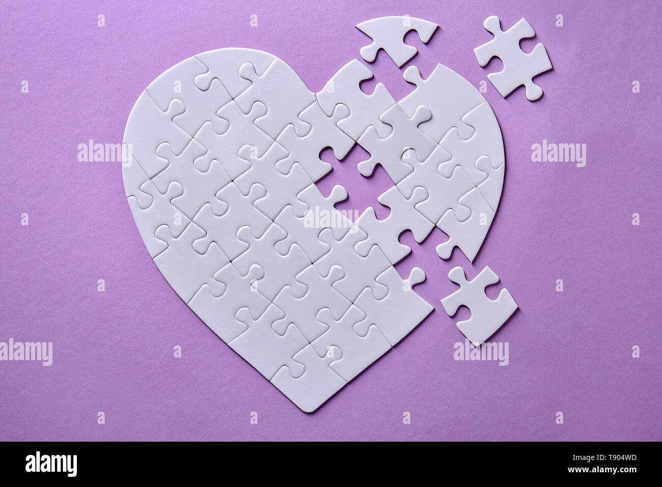 Incomplete heart puzzle hi-res stock photography and images - Alamy
