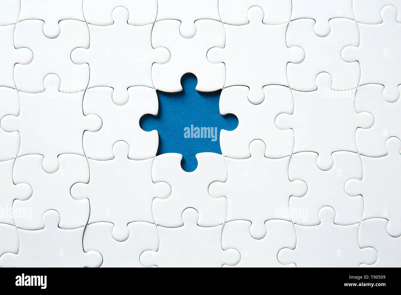 Jigsaw puzzle with missing fragment Stock Photo - Alamy