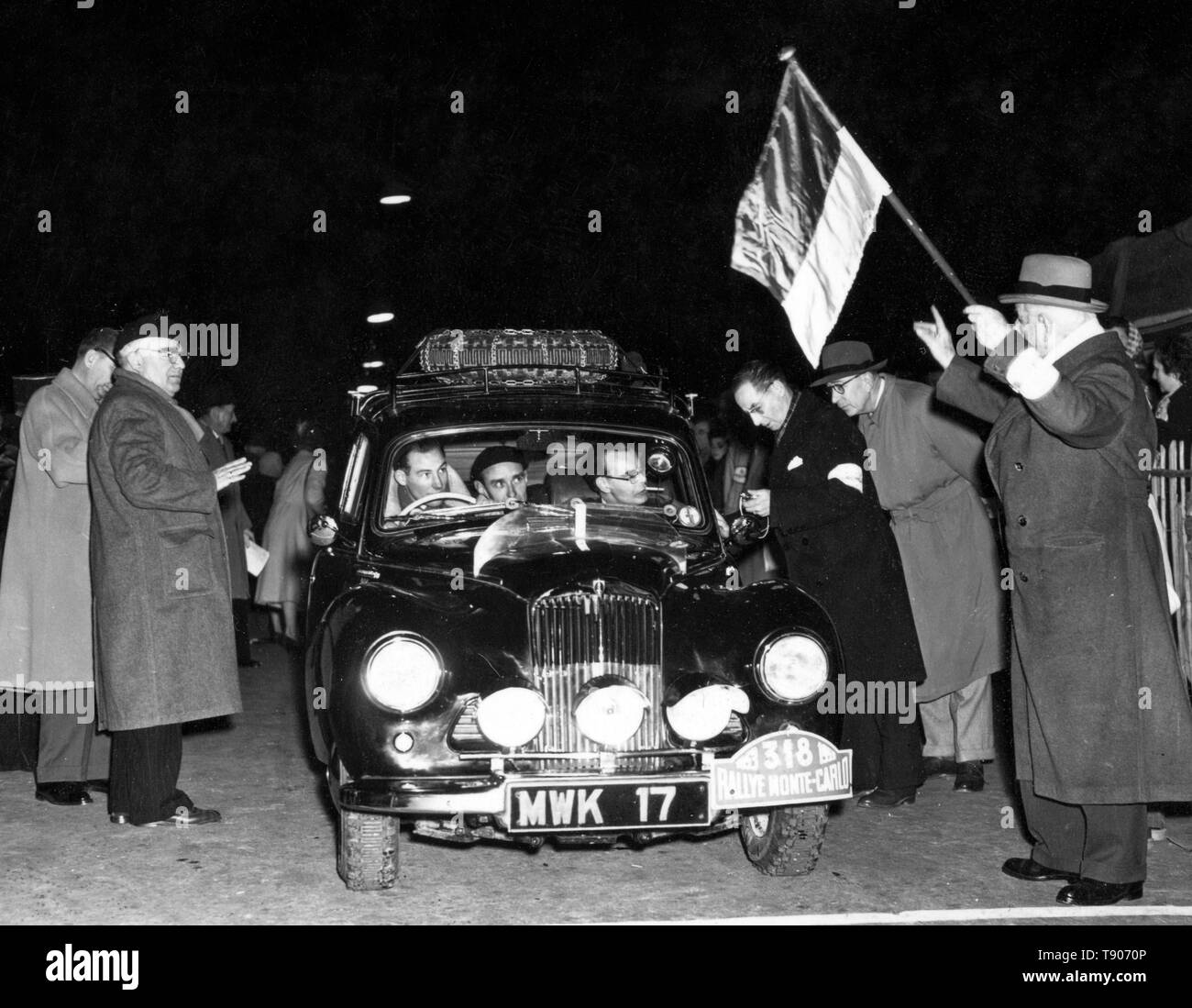 Young British Racing driver Stirling Moss leading a strong Sunbeam ...
