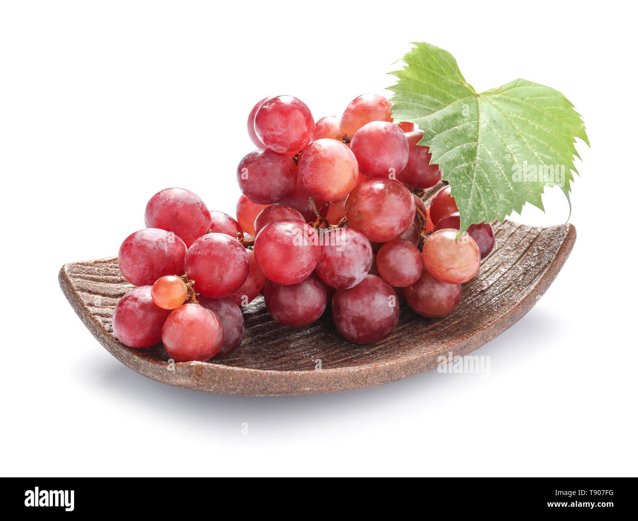 Plate with ripe grapes on white background Stock Photo - Alamy