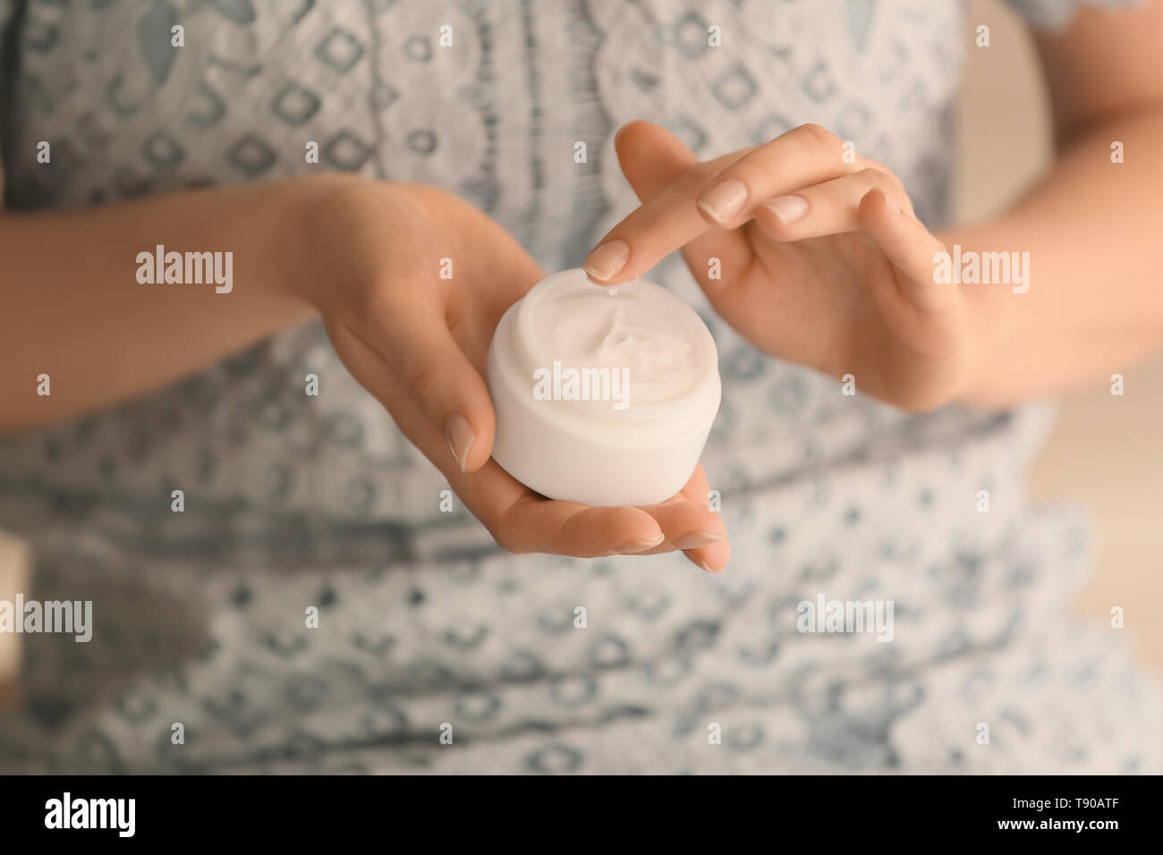 Woman applying body cream, closeup Stock Photo - Alamy