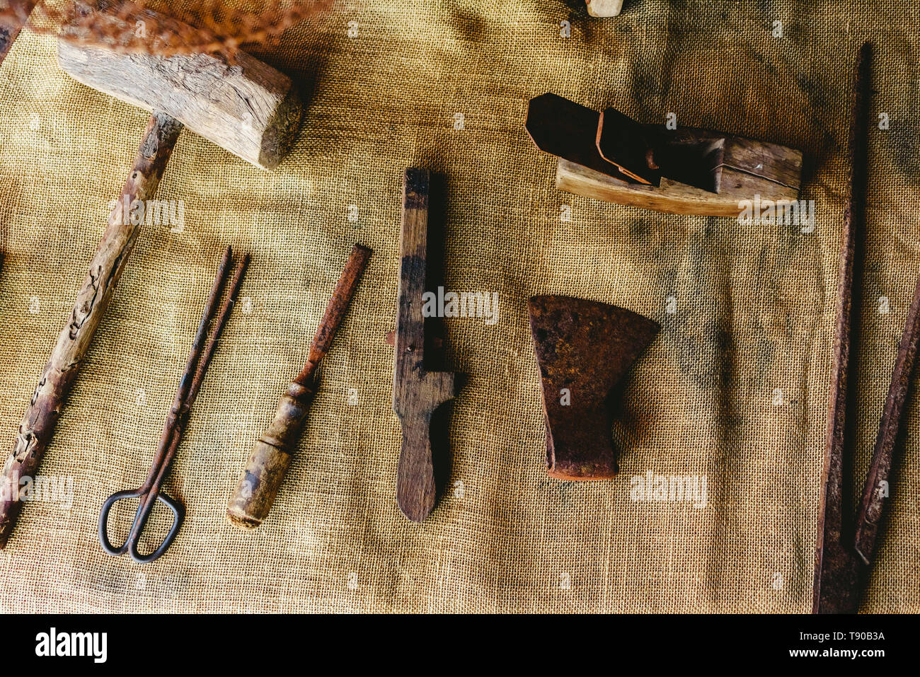 Old and rusty tools to work the wood in a boat Stock Photo - Alamy