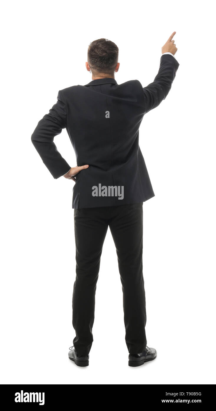 Businessman pointing at something on white background, back view Stock ...