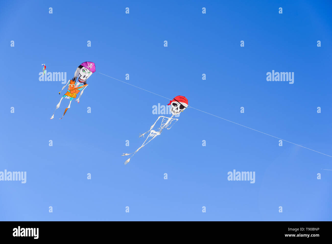 Two pirate skeleton-shaped kites, fun figures to play on hot summer ...