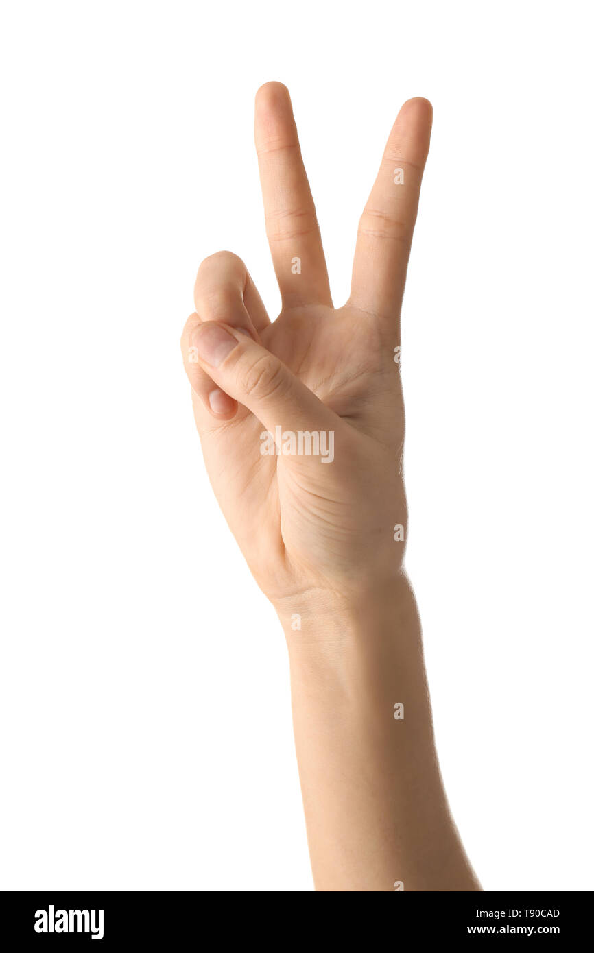 Female hand showing Victory gesture on white background Stock Photo - Alamy