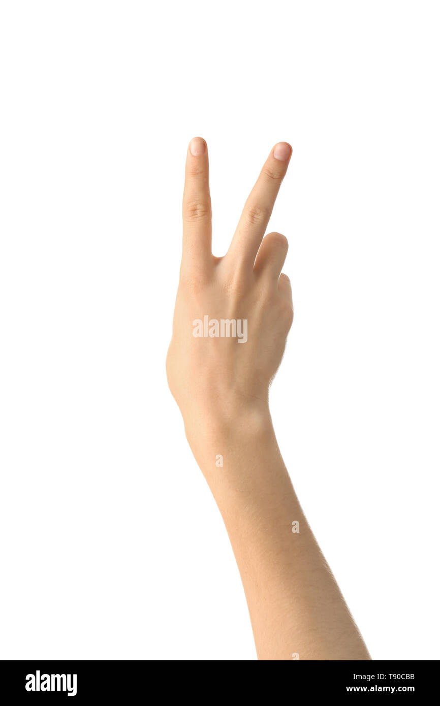 Female hand showing Victory gesture on white background Stock Photo - Alamy