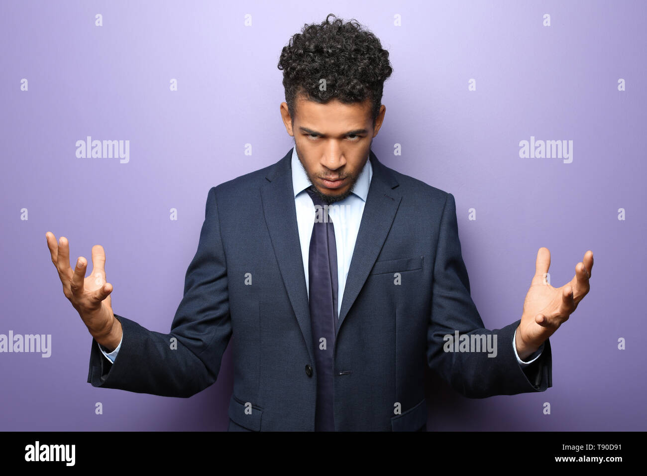 Annoyed angry afro young man hi-res stock photography and images - Alamy