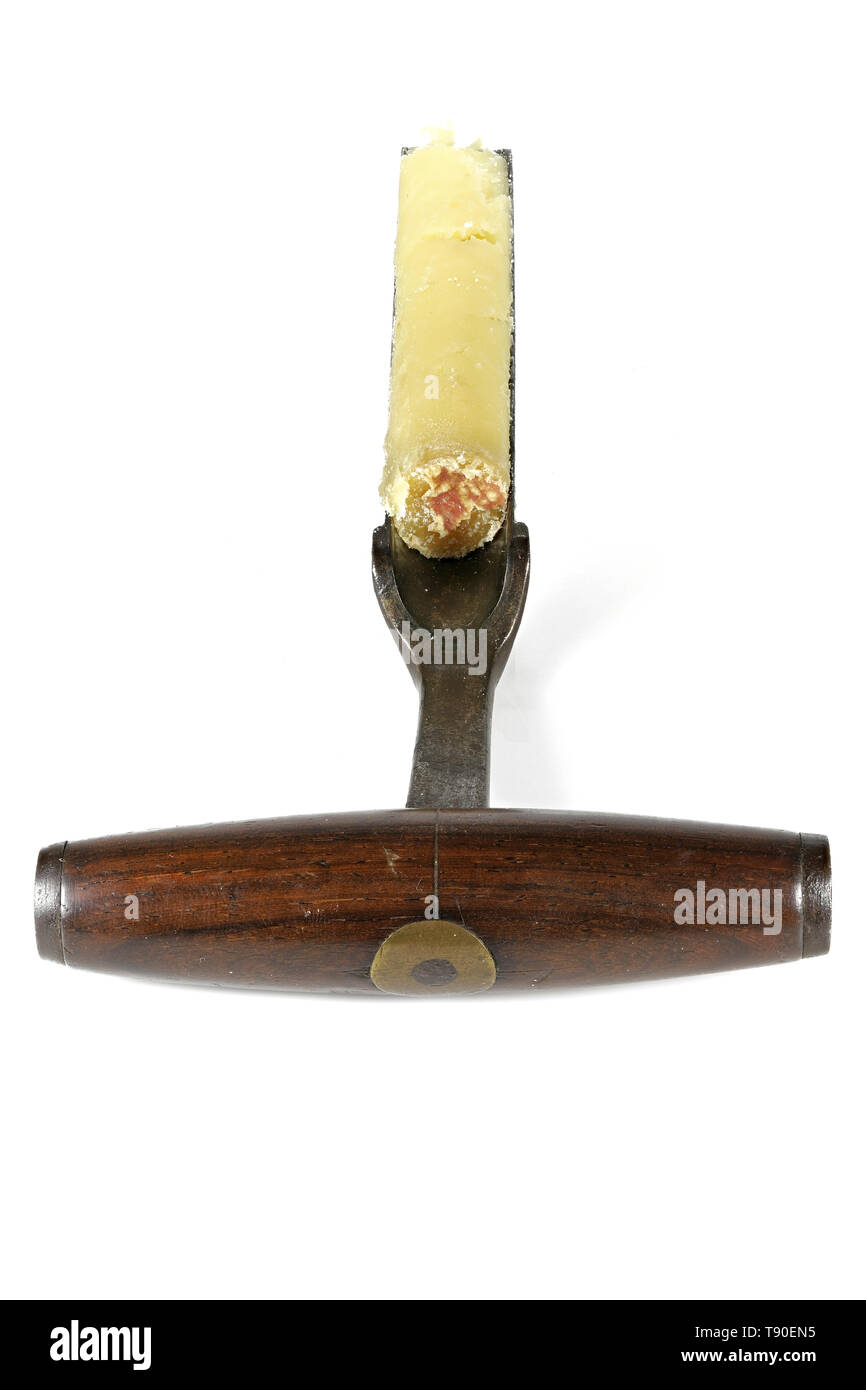 cheese iron with cheese sample isolated on white background Stock Photo ...