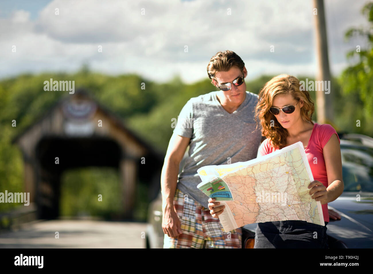 Two people looking over a map hi-res stock photography and images - Alamy