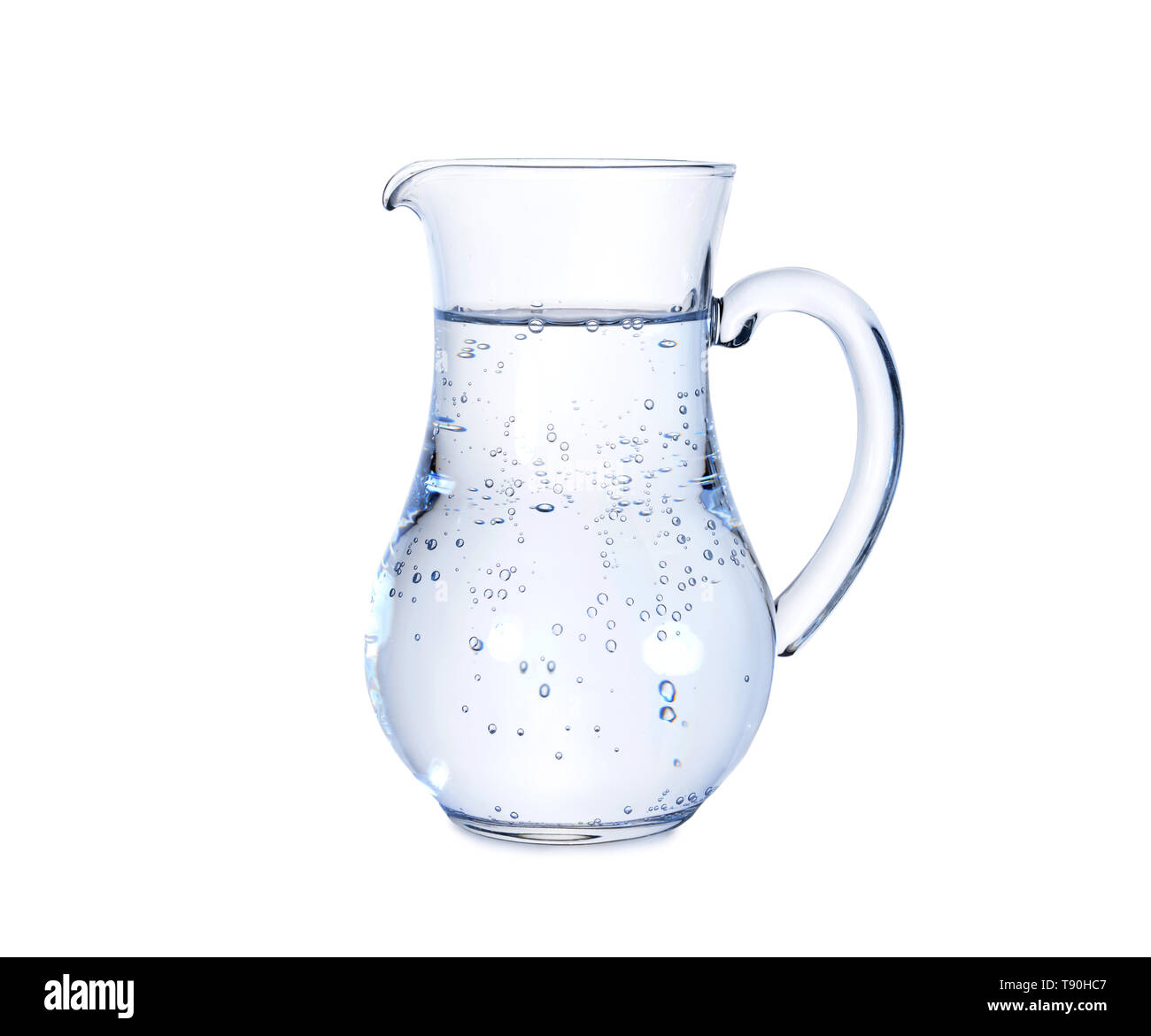 Jug with cold fresh water on white background Stock Photo - Alamy