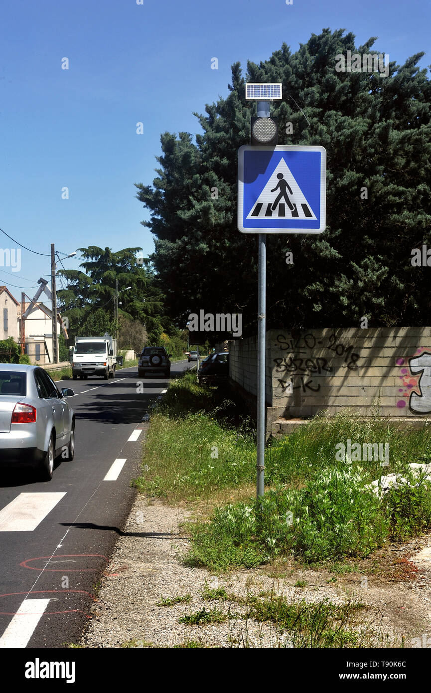 sign indicating a protected crossing on the road for pedestrians Stock ...