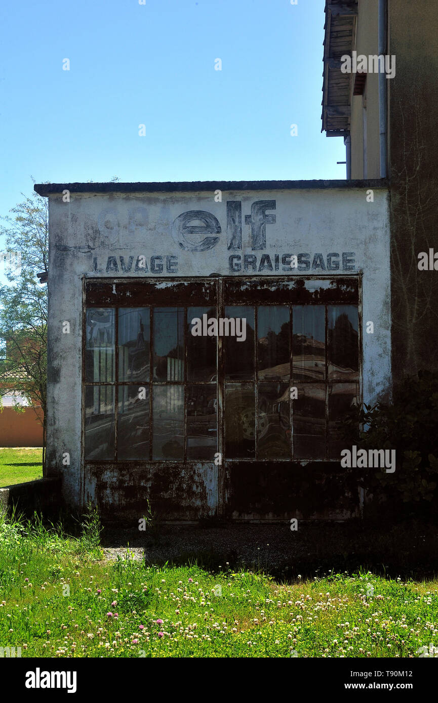 front of an old mechanical garage abandoned in rural areas Stock Photo ...