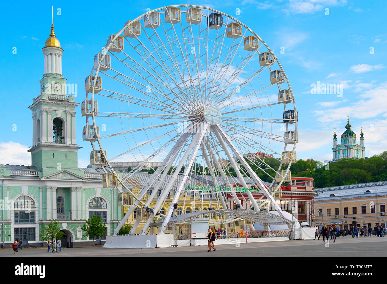 KIEV, UKRAINE - MAY 11, 2019: People walking by giant Ferries Wheel in ...