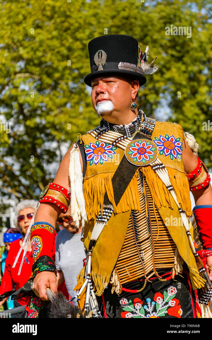 Inidigenous man wearing beads and feather regalia at DTES Pow Wow and ...