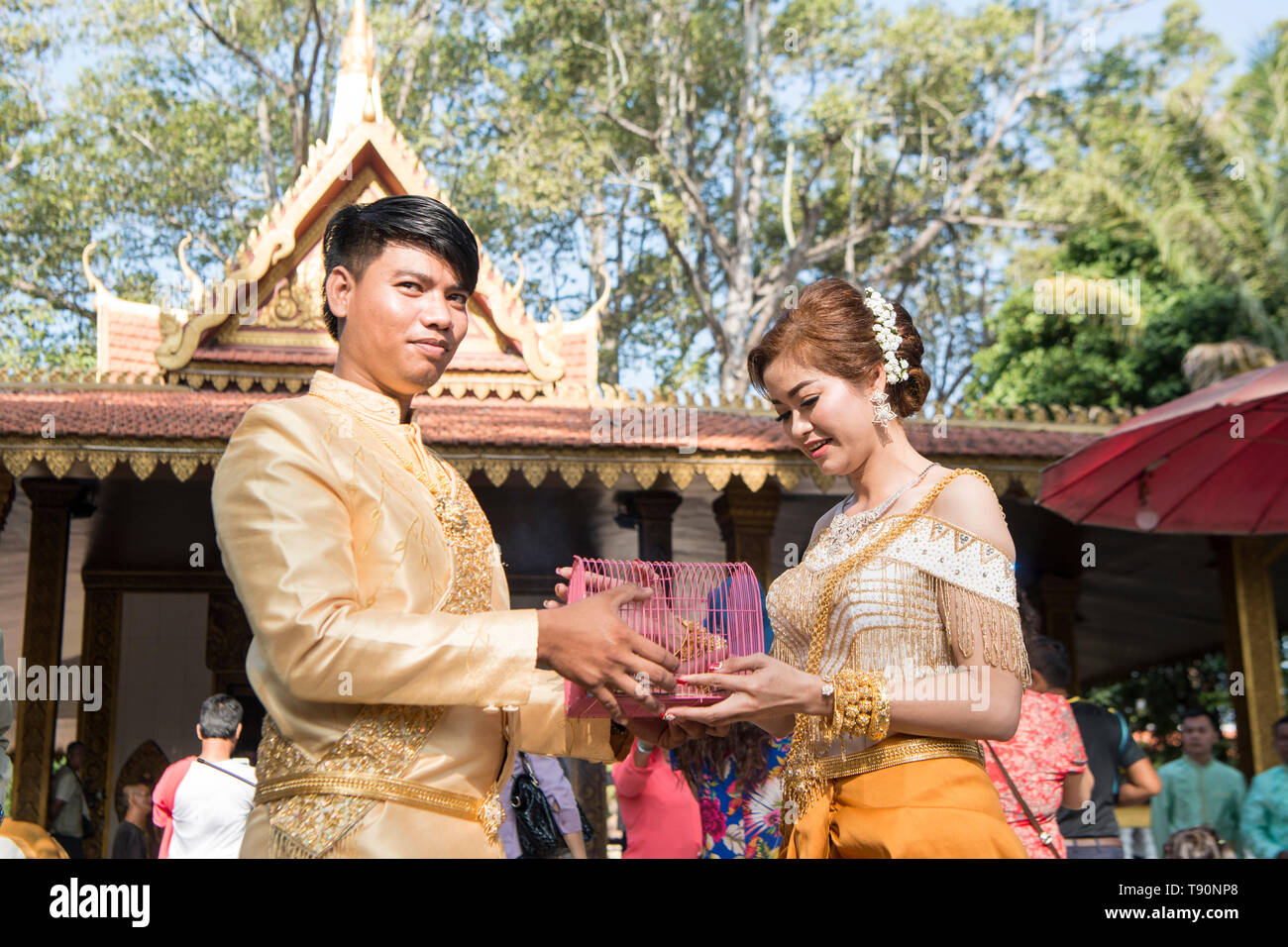 a khmer wedding ceremony at the Preah Angchek or Preah Ang Chorm Shrine ...