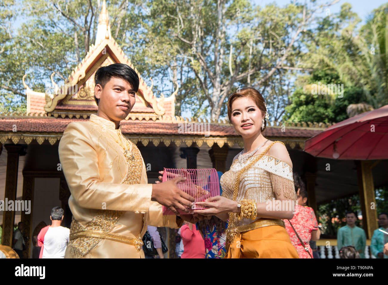 a khmer wedding ceremony at the Preah Angchek or Preah Ang Chorm Shrine ...
