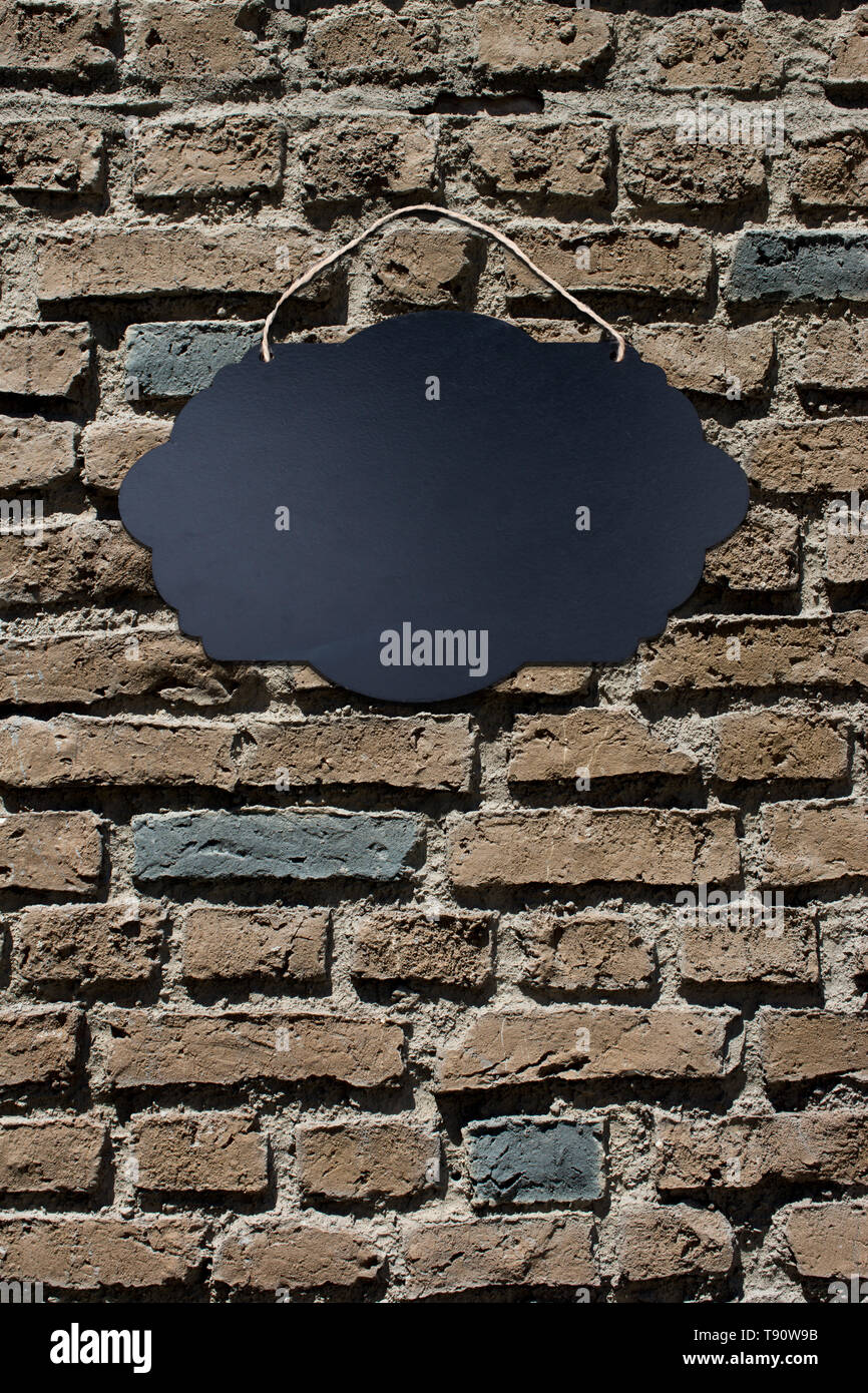 Black Empty Sign Board with string for hanging on wall Stock Photo - Alamy