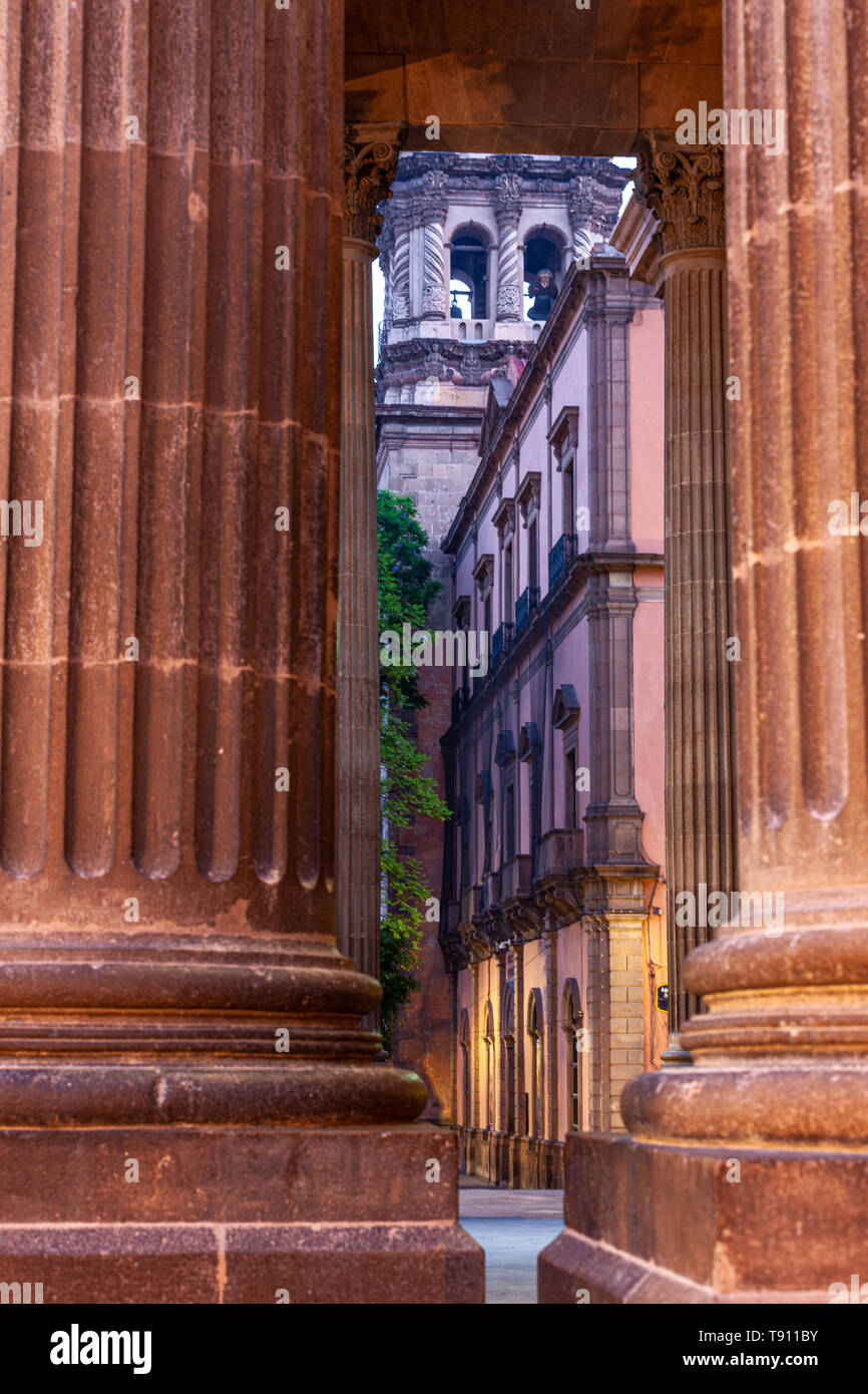 Church steeple through columns Stock Photo - Alamy