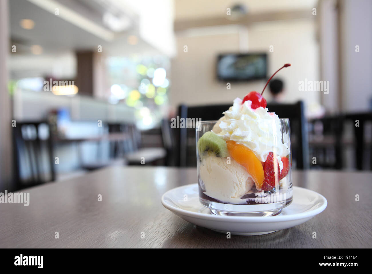 Fruit with ice cream Stock Photo - Alamy