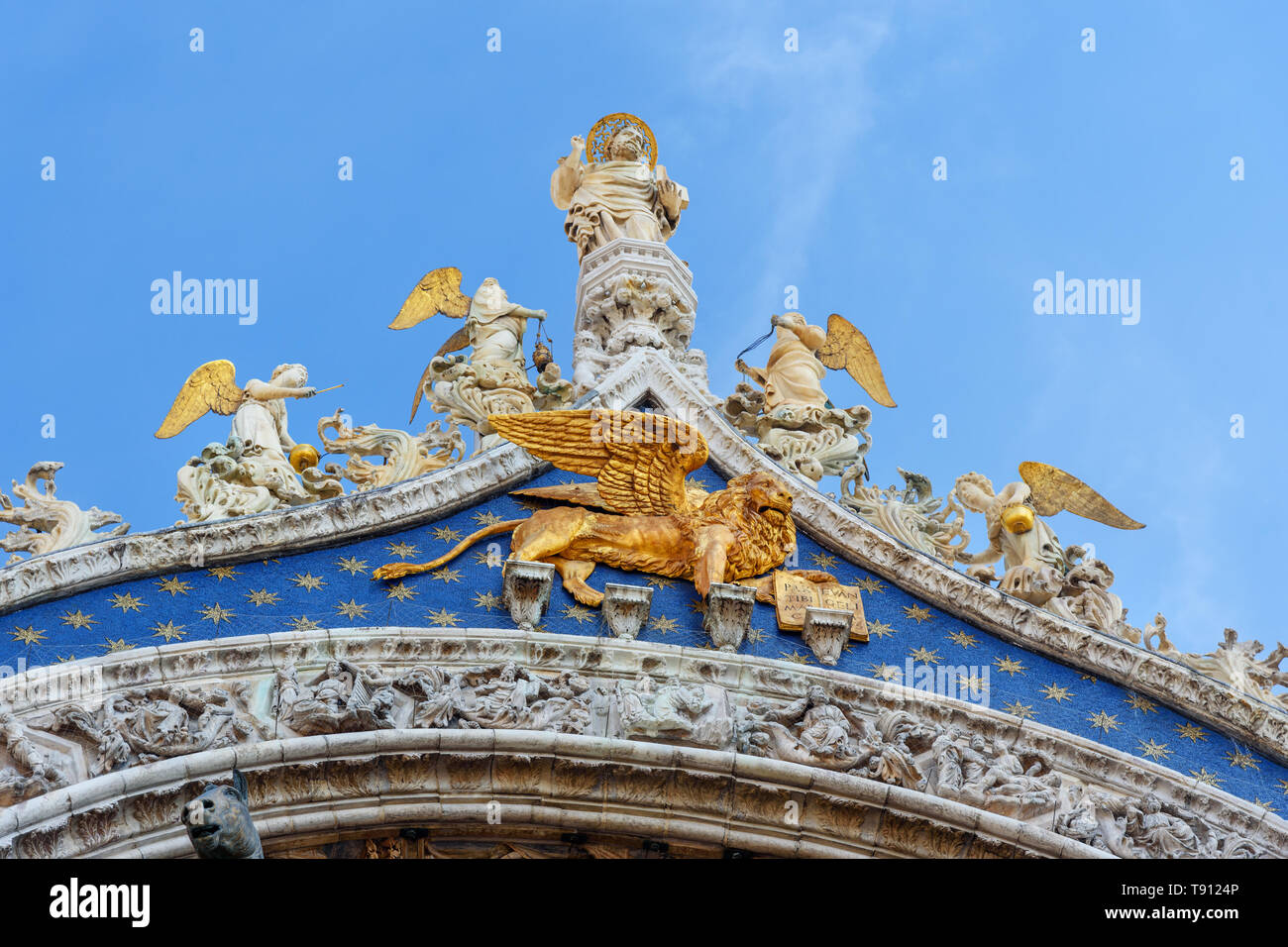 Detail of gable with Venice's patron apostle St. Mark with angels and ...