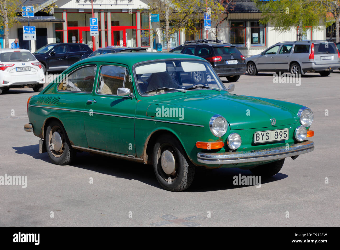 Rattvik, Sweden - May 14, 2019: Front and side view of a green 1972 ...