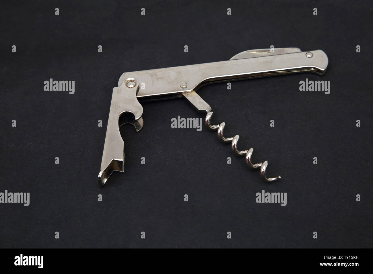 Stainless Steel Corkscrew and Bottle Opener Stock Photo - Alamy