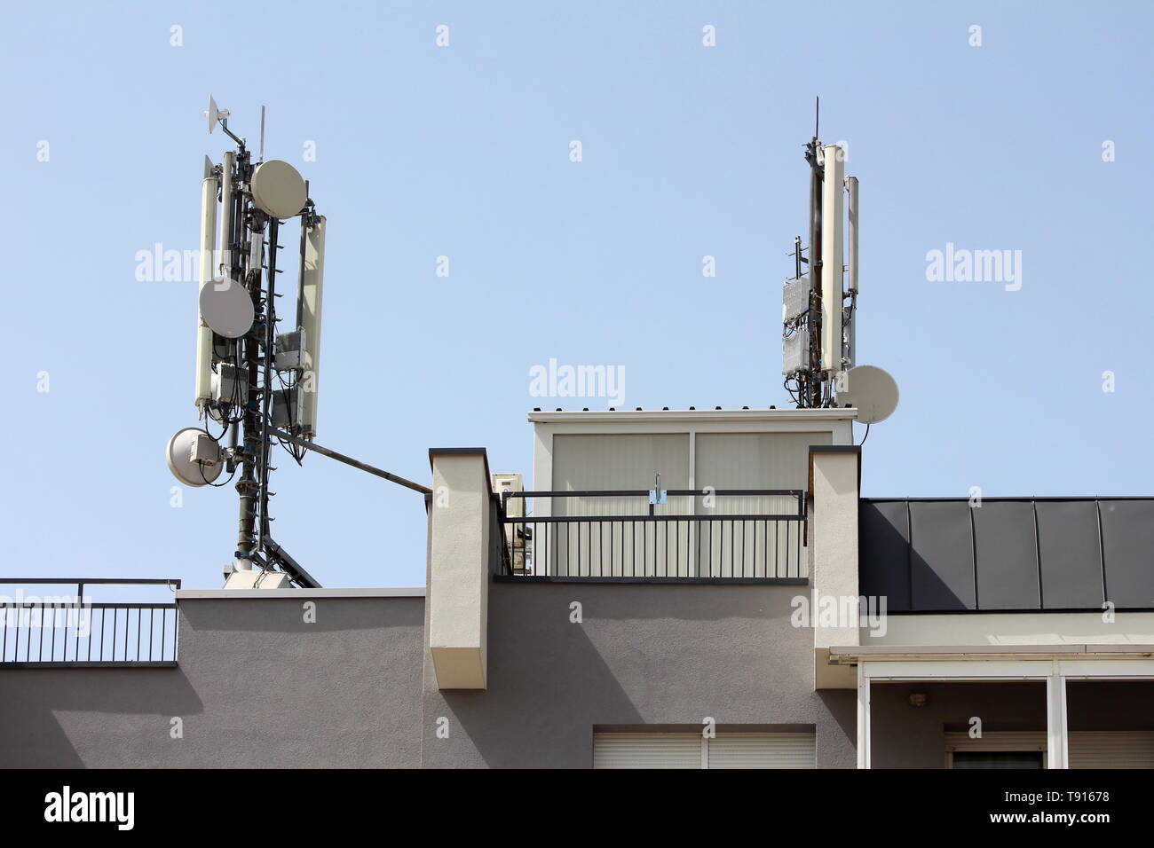 Densely mounted multiple cell phone transmitters and antennas on strong ...