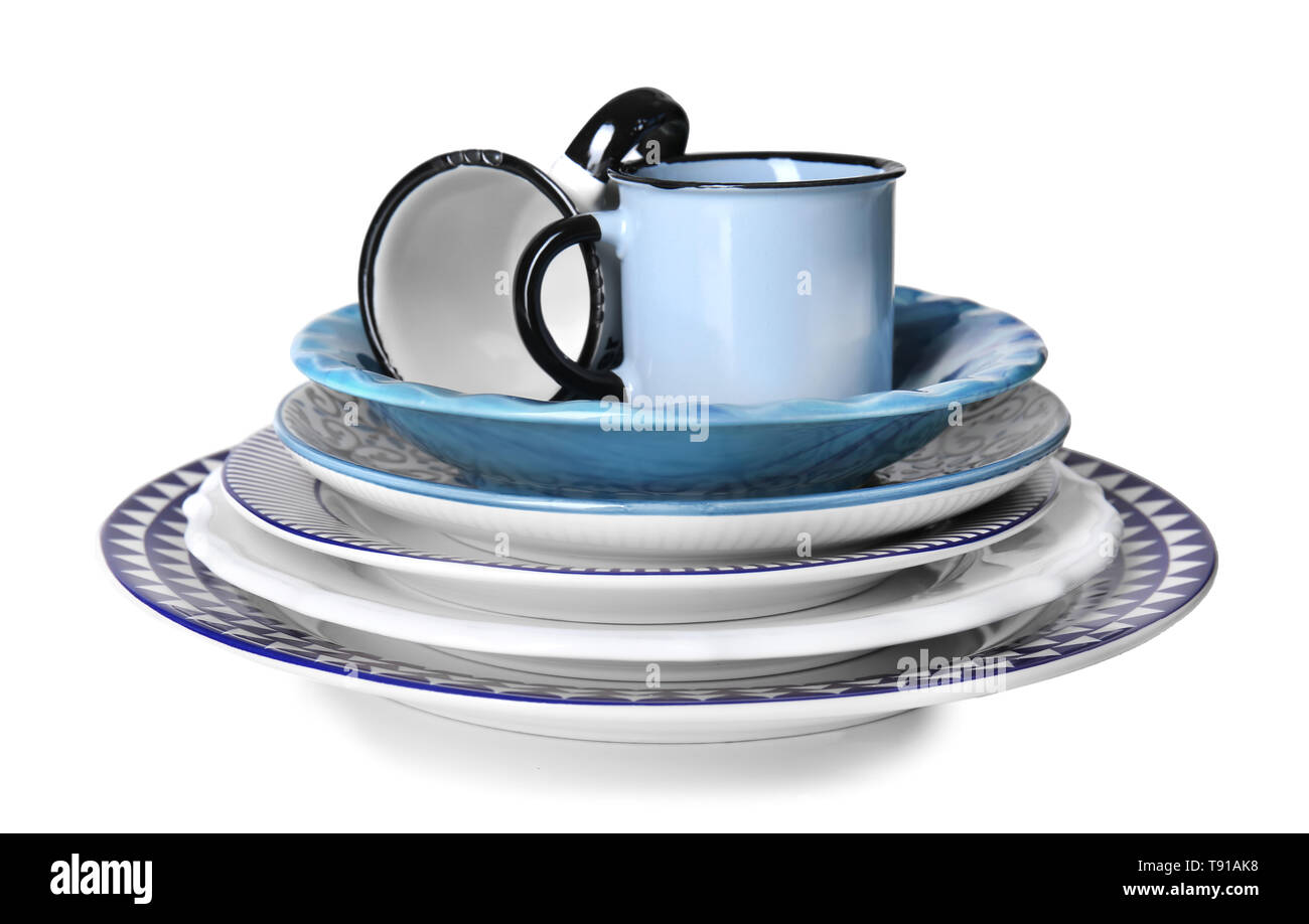 Set of clean tableware on white background Stock Photo - Alamy