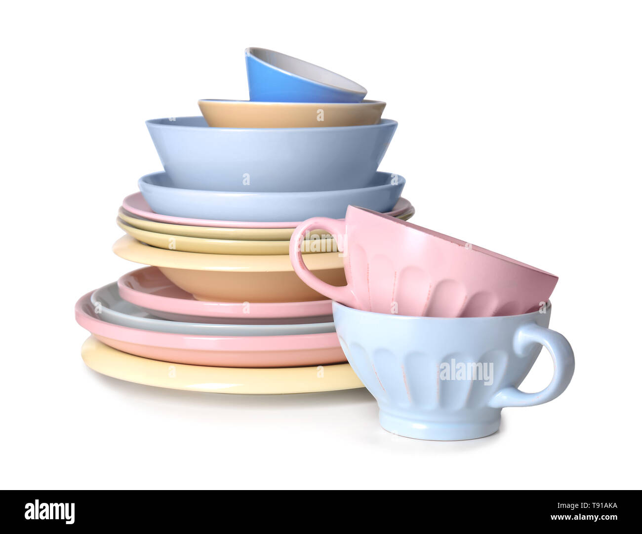Set of clean tableware on white background Stock Photo - Alamy