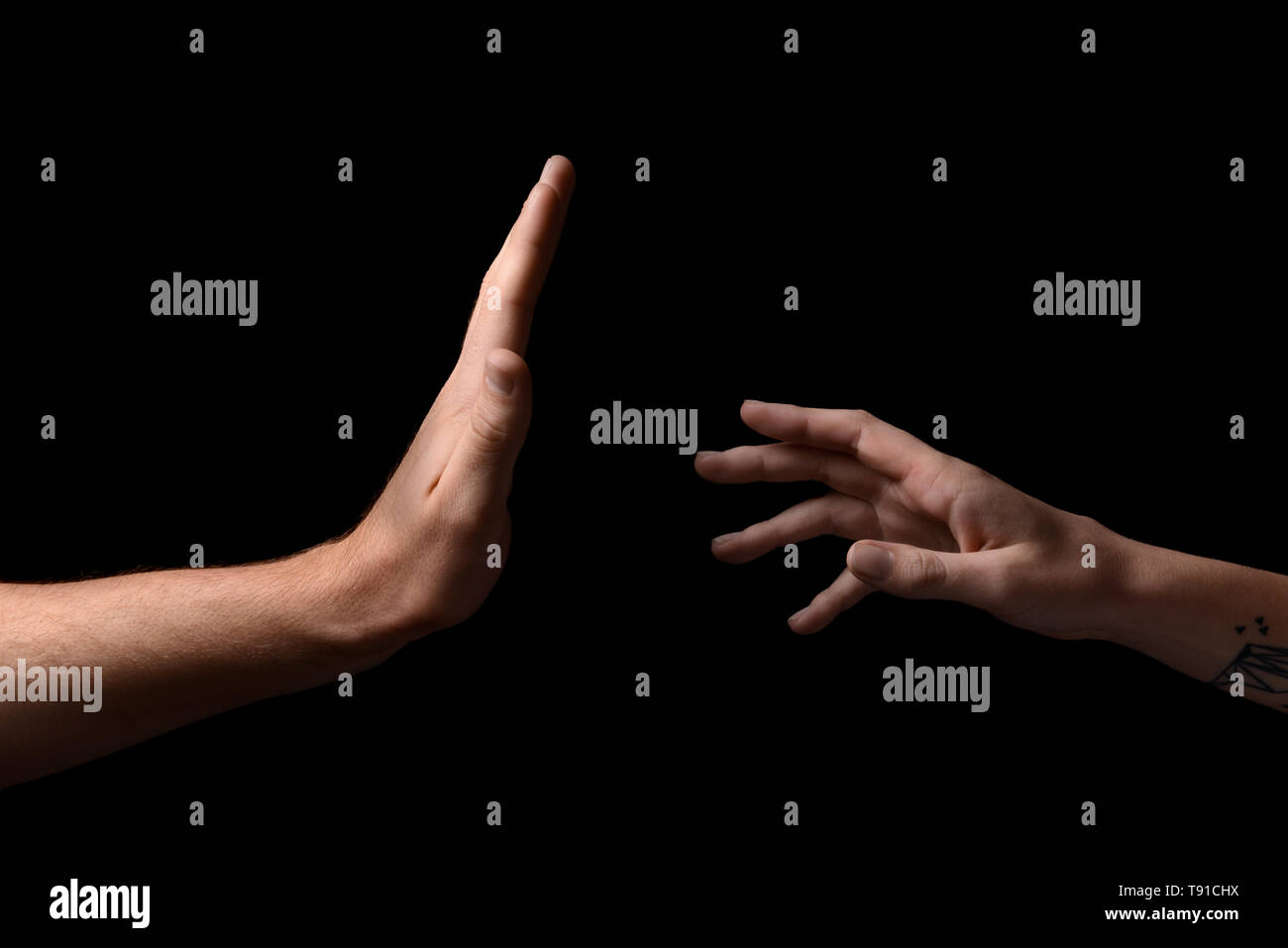 Hands stopping man hi-res stock photography and images - Alamy