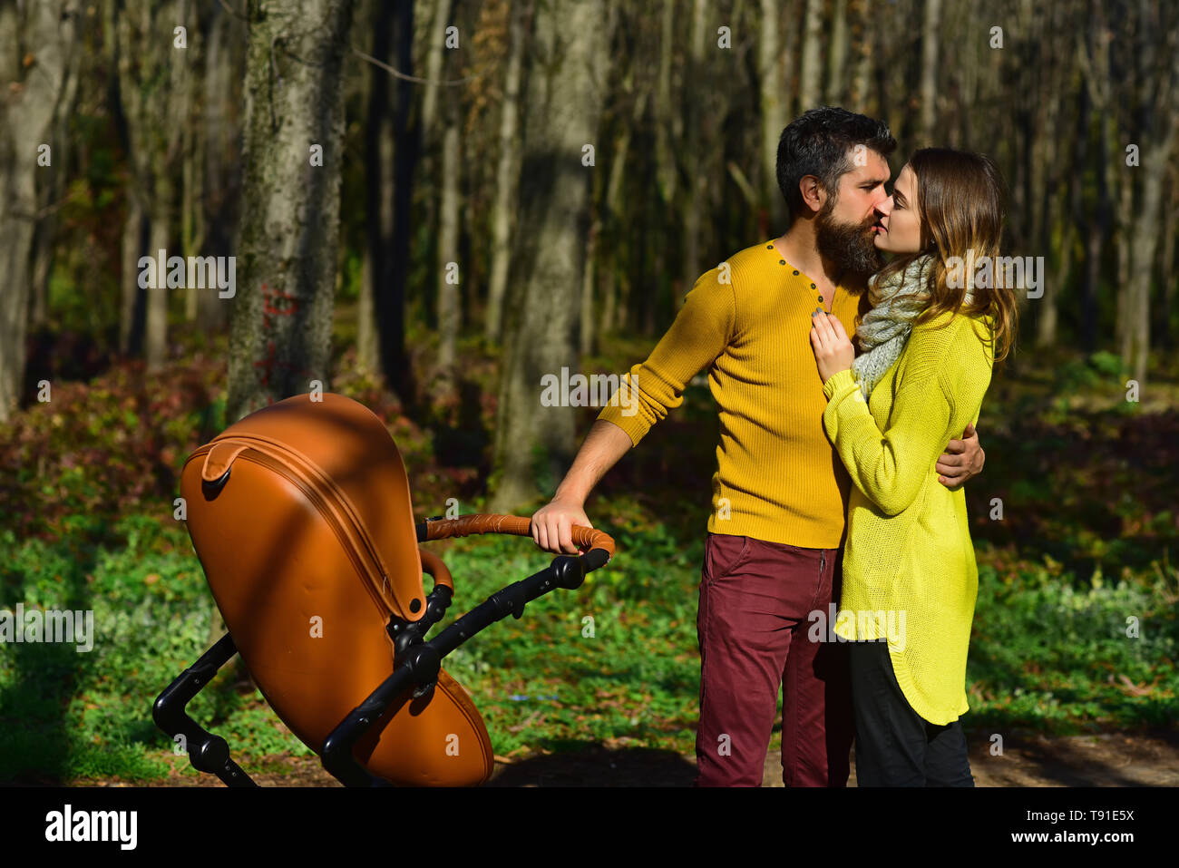 Romantic couple kiss and cuddle in park on spring day. Romantic getaway ...