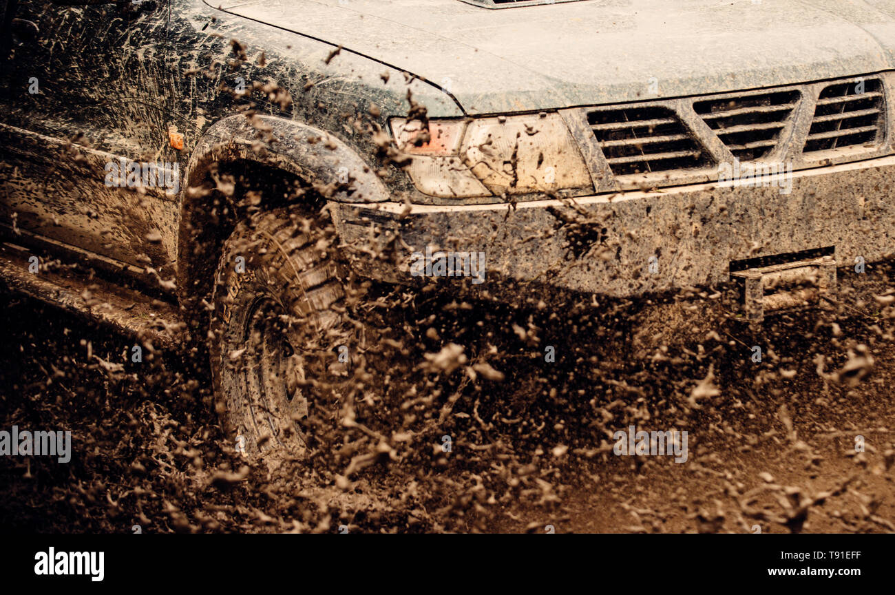 Experience some truly challenging terrain. Offroad car in action. Car ...