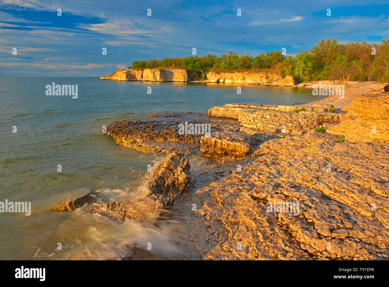 Limestone cliffs along Lake Manitoba at sunset Steeprock Manitoba ...