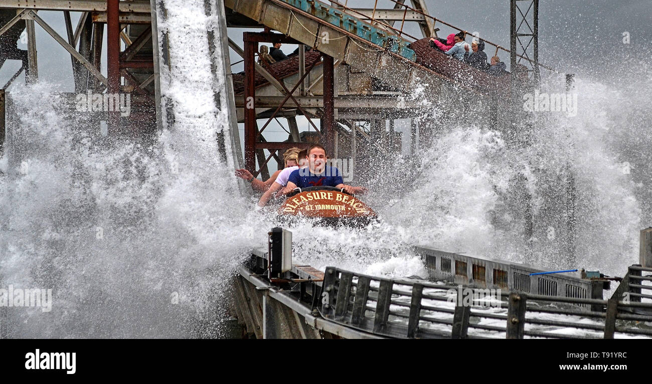 Young men riding the log flume at Great Yarmouth Pleasure Beach ...