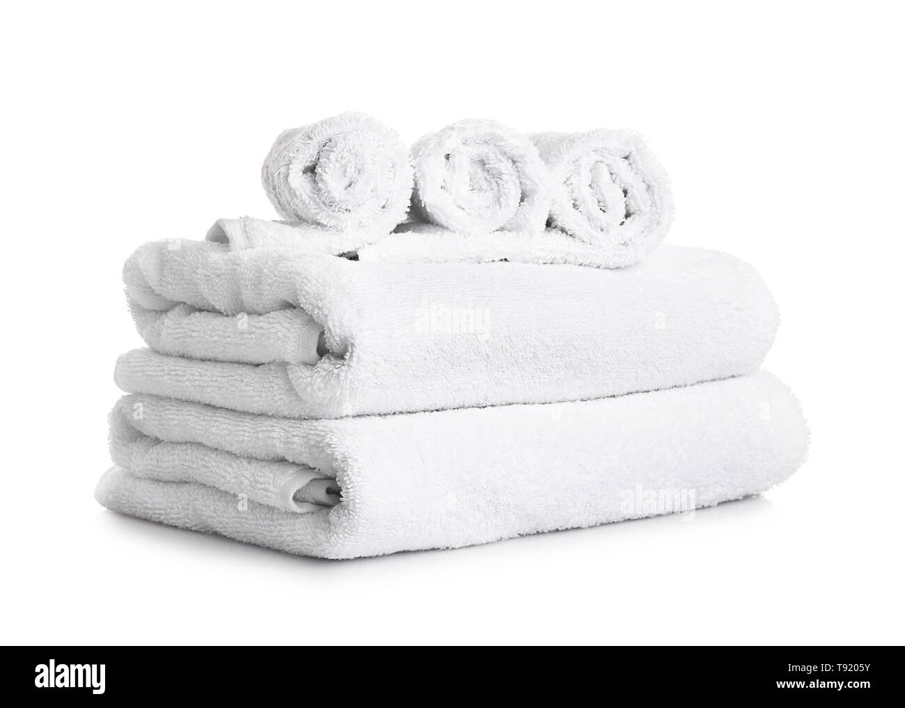 Stack of clean towels on white background Stock Photo - Alamy