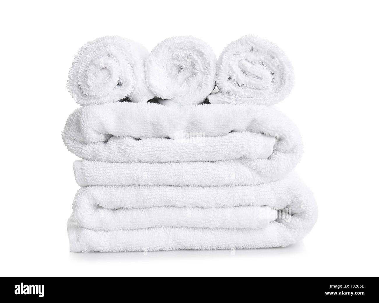 Stack of clean towels on white background Stock Photo - Alamy
