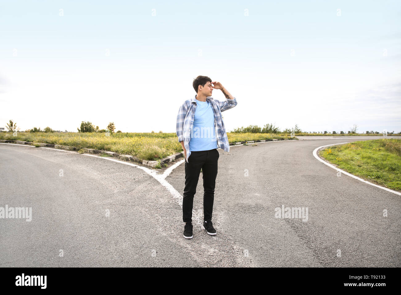 Man standing at crossroads hi-res stock photography and images - Alamy