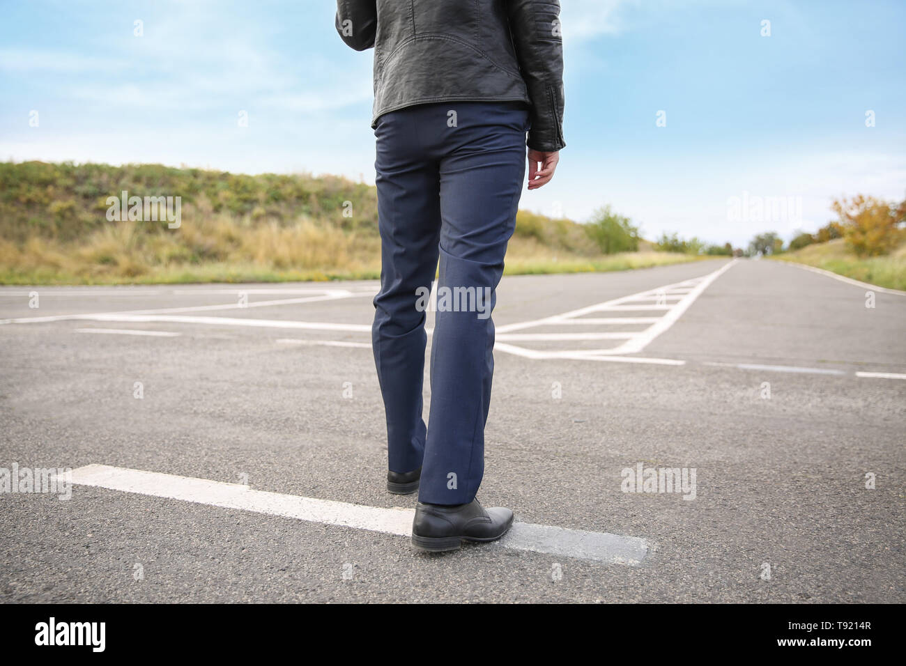 Business man standing at the crossroads hi-res stock photography and ...