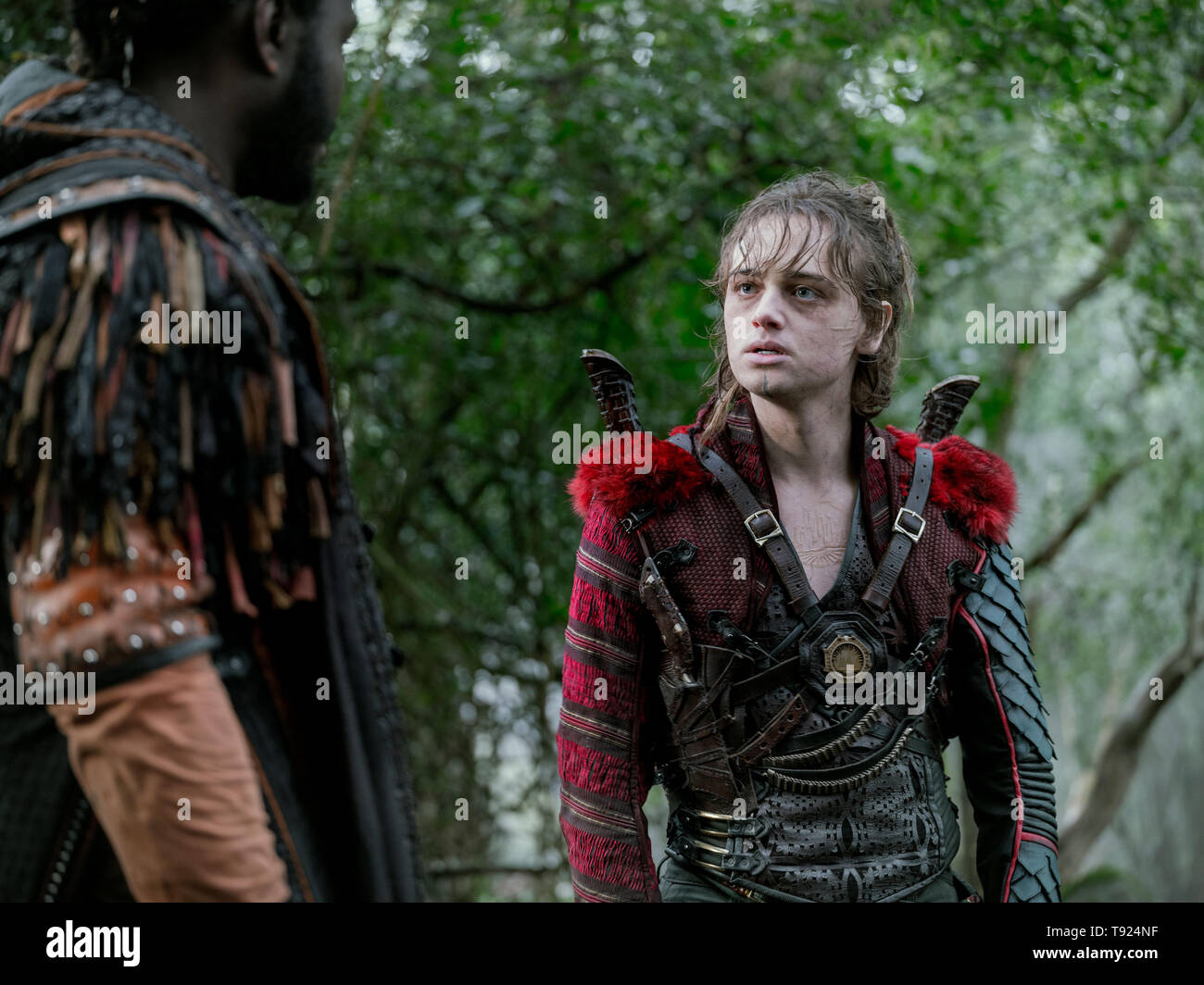 INTO THE BADLANDS, from left: Babou Ceesay (back to camera), Dean ...